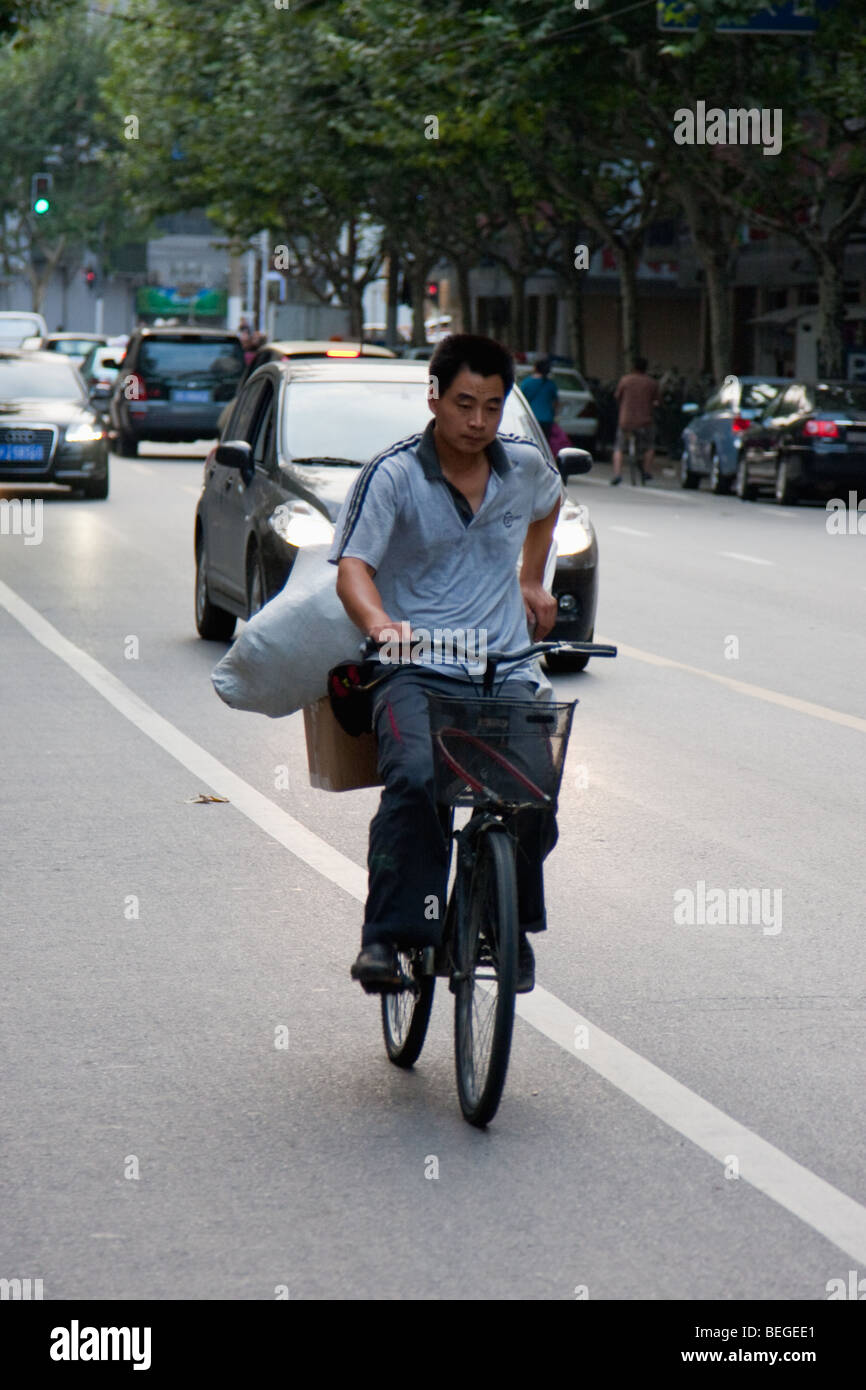 Man heavy load on bike hi-res stock photography and images - Alamy