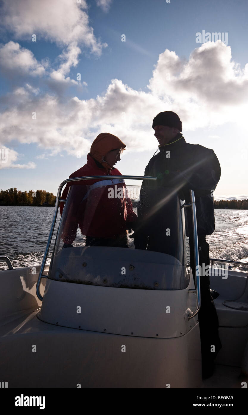 Happy couple on a boat trip Stock Photo - Alamy