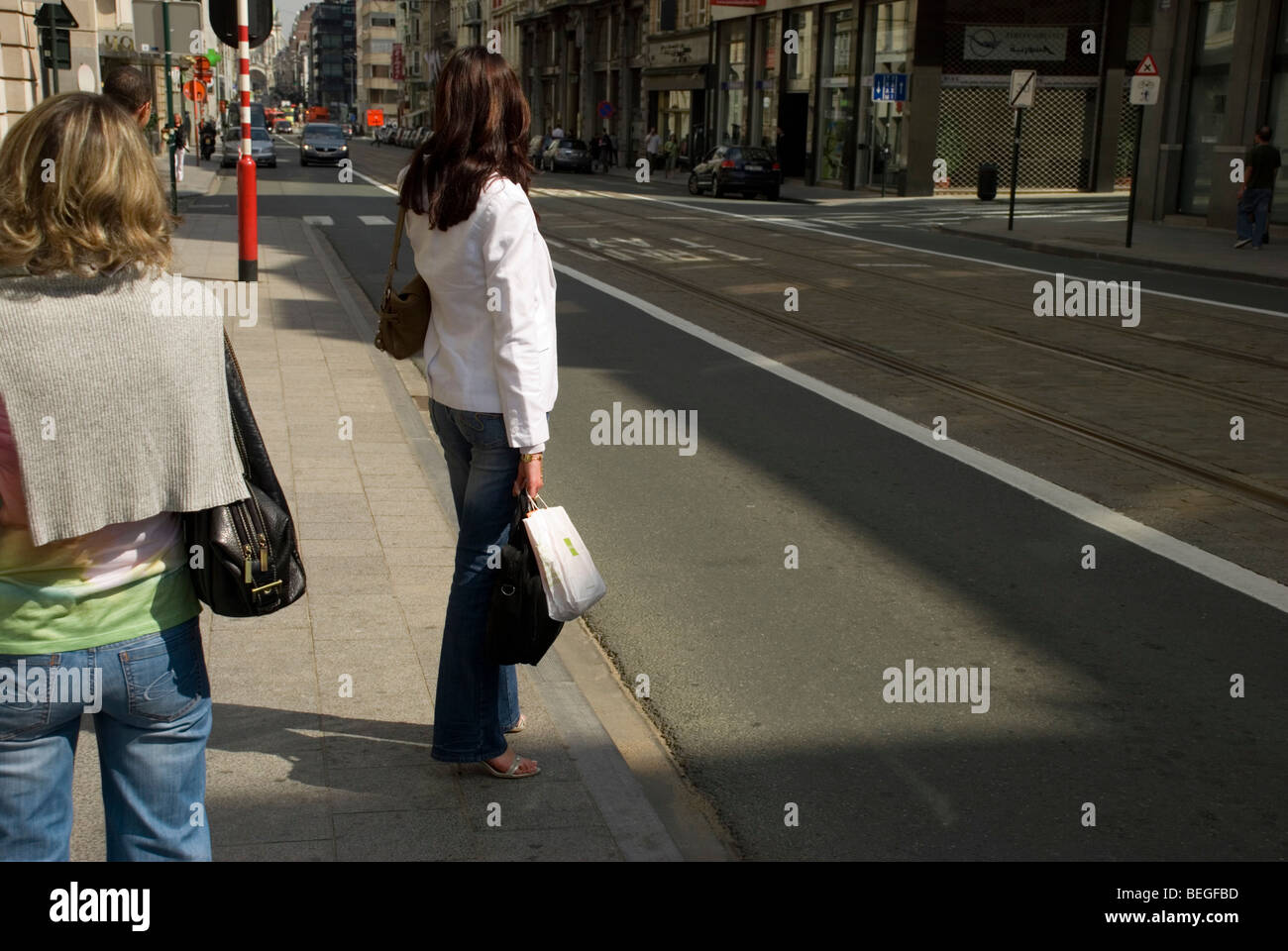 Waiting for a bus Stock Photo - Alamy