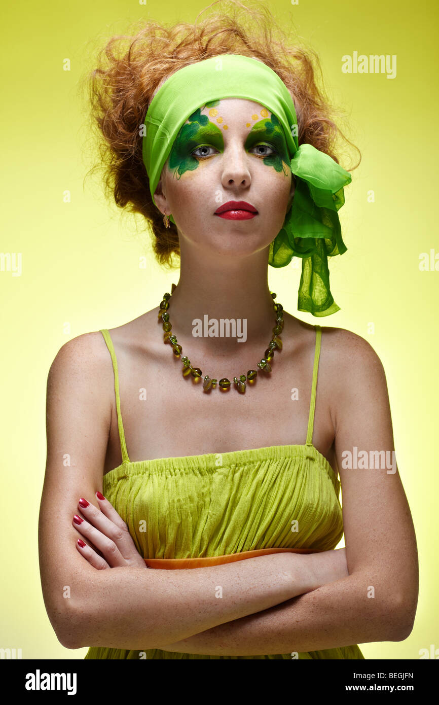 portrait of beautiful red-haired model with shamrock body art Stock ...