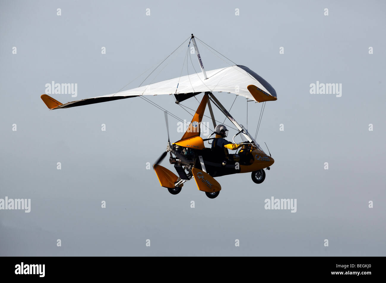 A weight-shift microlight flying from Compton Abbas airfield in Dorset ...