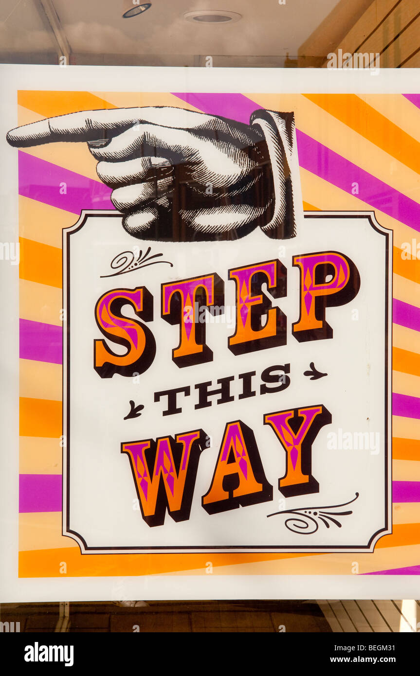 A sign reading Step This Way in the Uk Stock Photo - Alamy