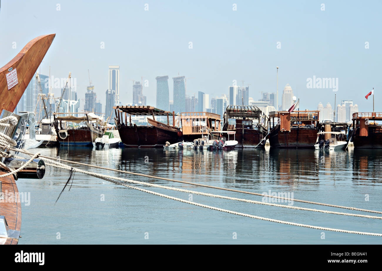A view of the dhow harbour in Doha, Qatar, with the modern high-rise ...