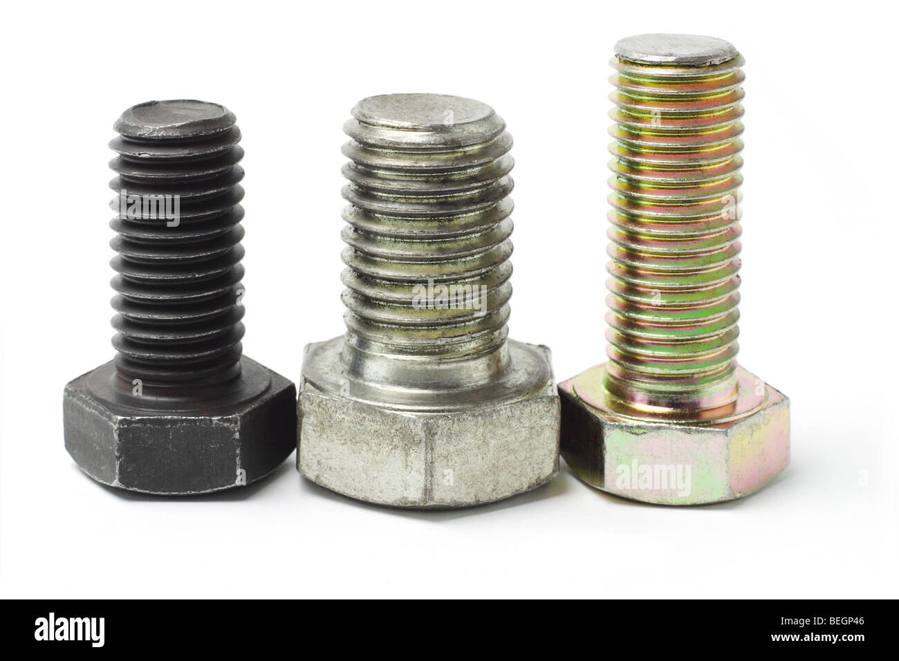 Three used bolts arranged on white background Stock Photo - Alamy