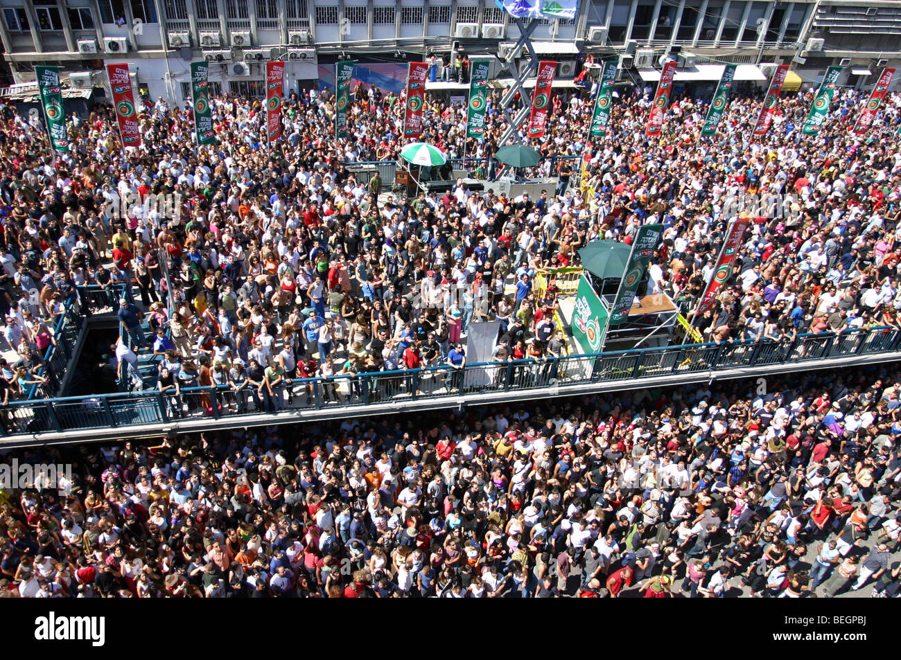 Israel, Tel Aviv, Tens of thousands of people at an outdoor street ...