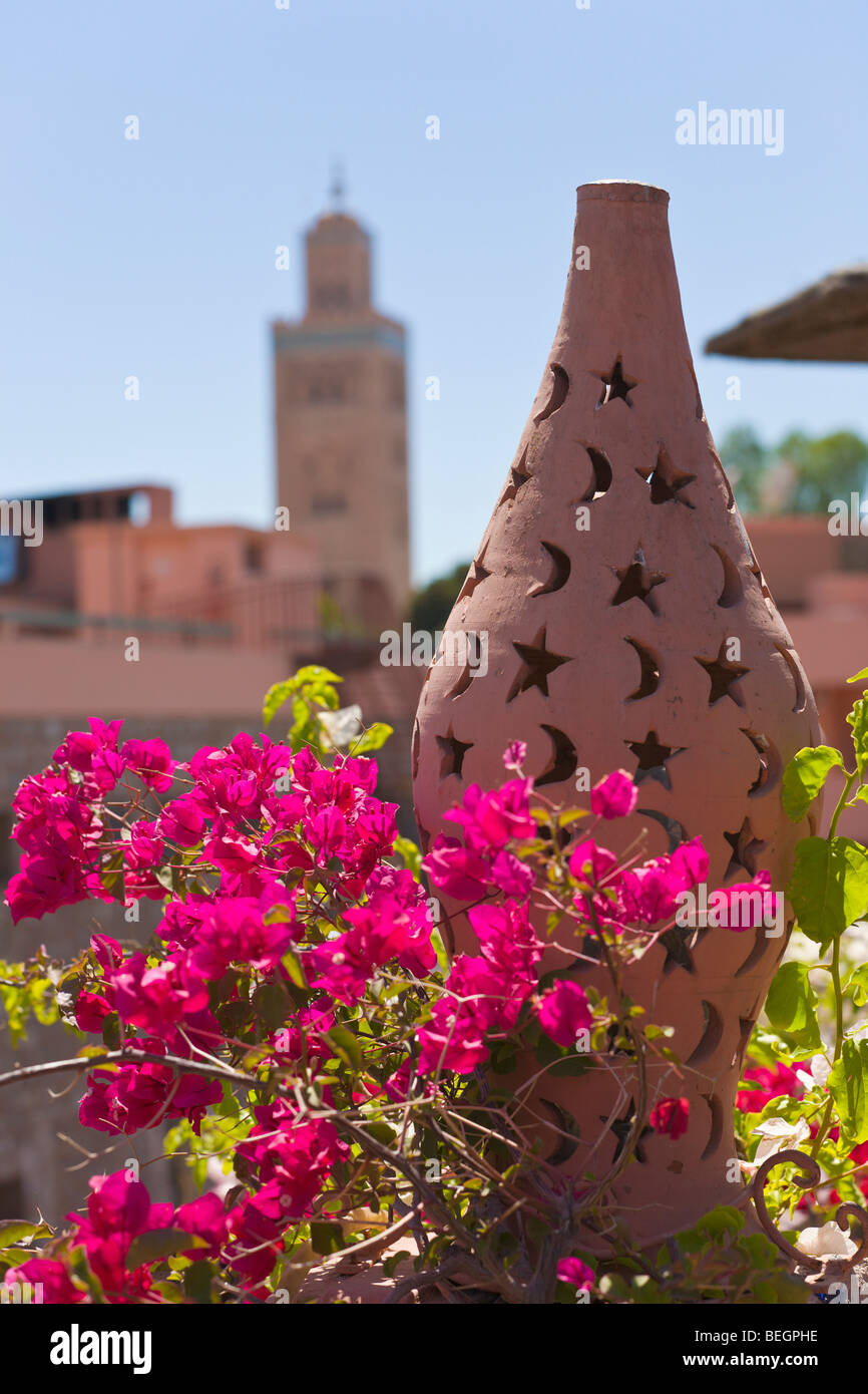 Clay pot bougainvillea and Koutoubia minaret Marrakech Morocco Stock ...