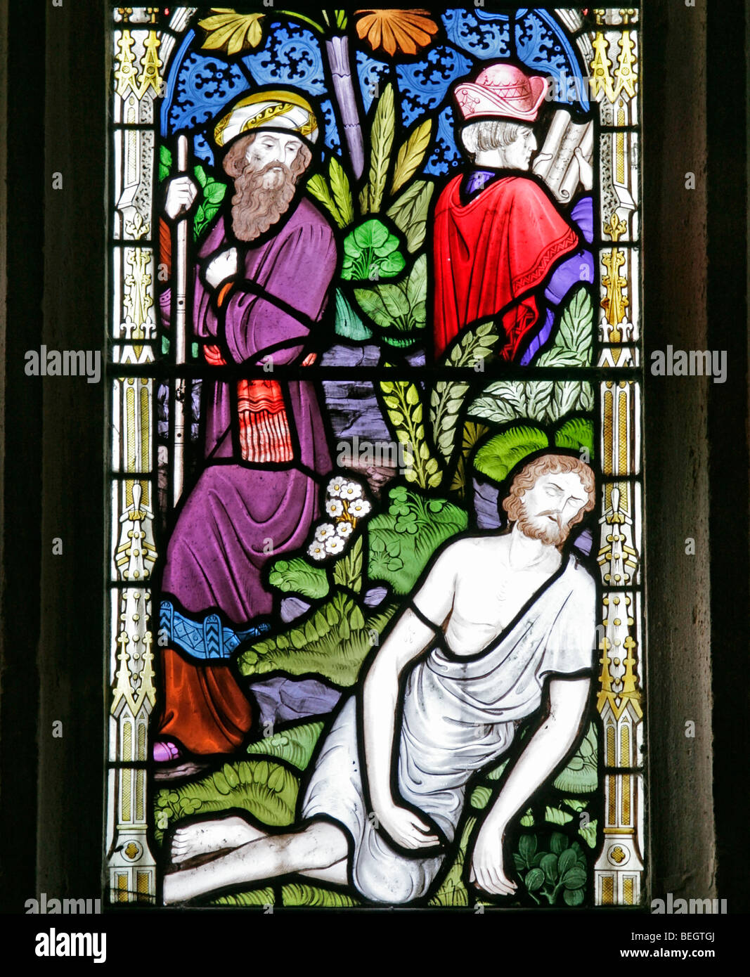 A stained glass window depicting the story of the Good Samaritan by ...