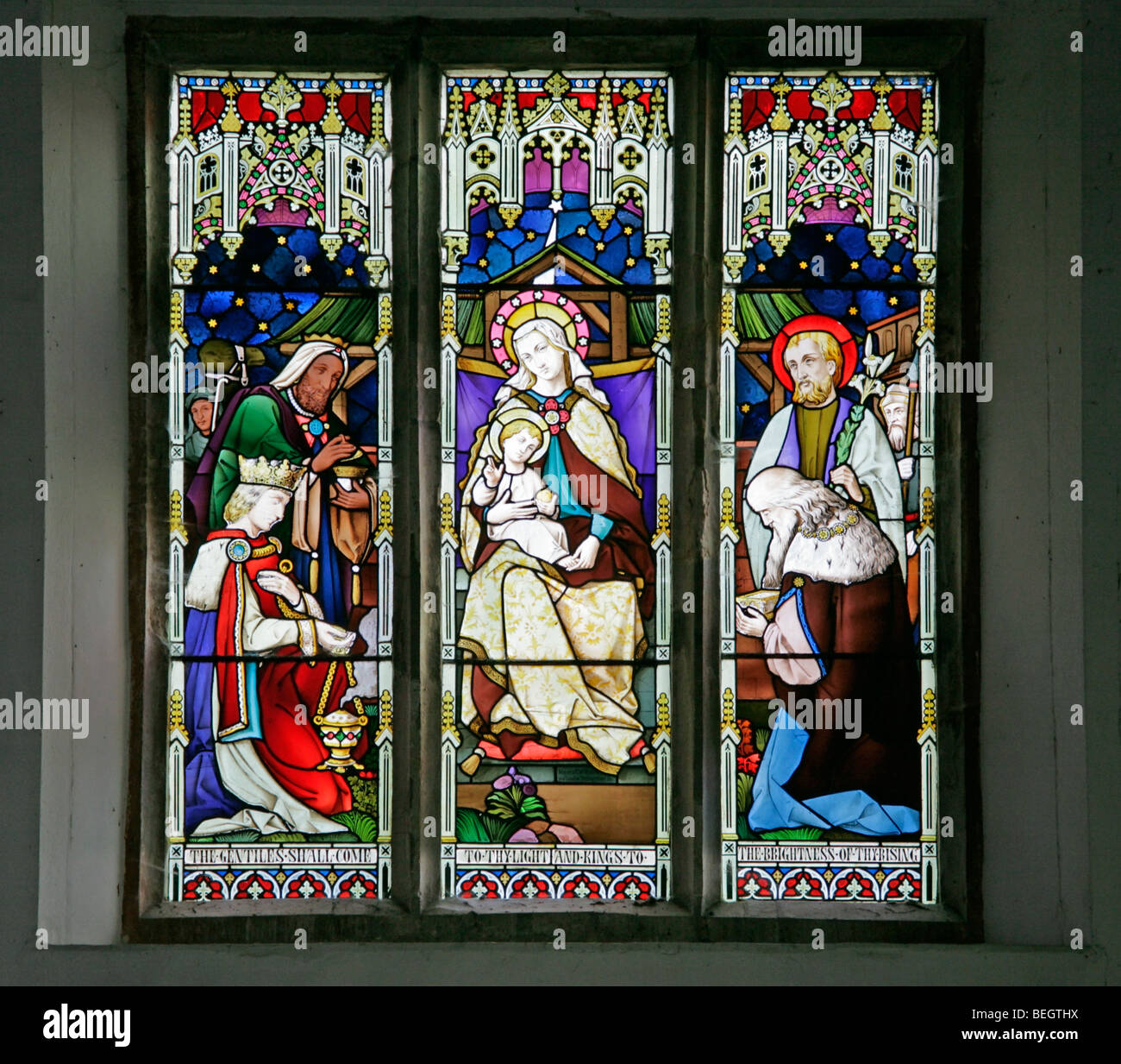 A stained glass window by Mayer & Co. depicting the Adoration of the ...