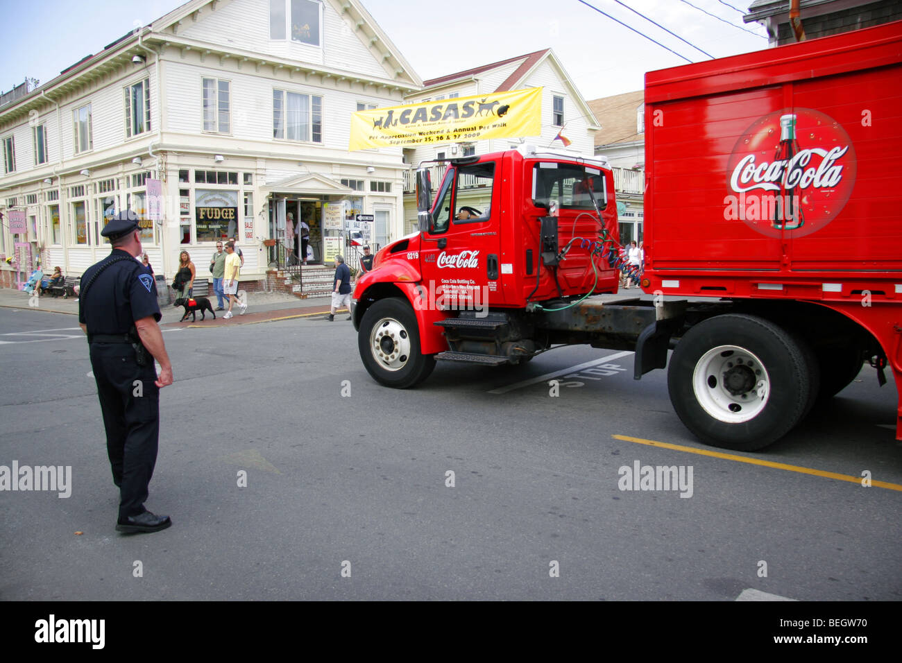 Coca Cola truck passing a cop in Provincetown, Cape Cod, New England ...