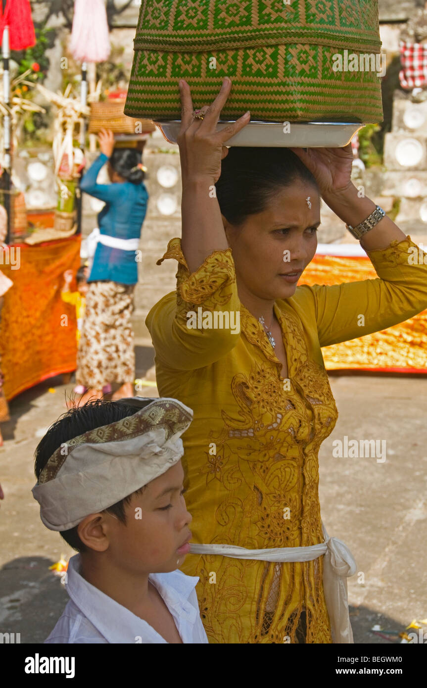 woman taking part in a traditional funeral and cremation ceremony in ...