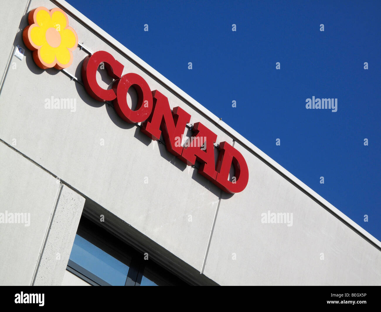 A storefront sign for a branch of the Italian supermarket chain Conad ...