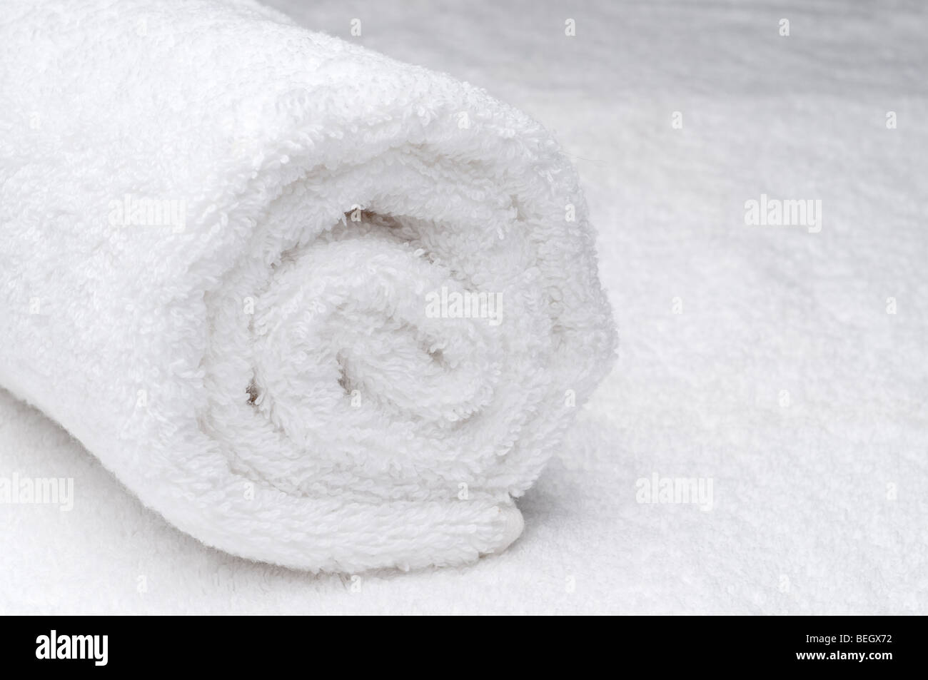 Rolled white towel hi-res stock photography and images - Alamy