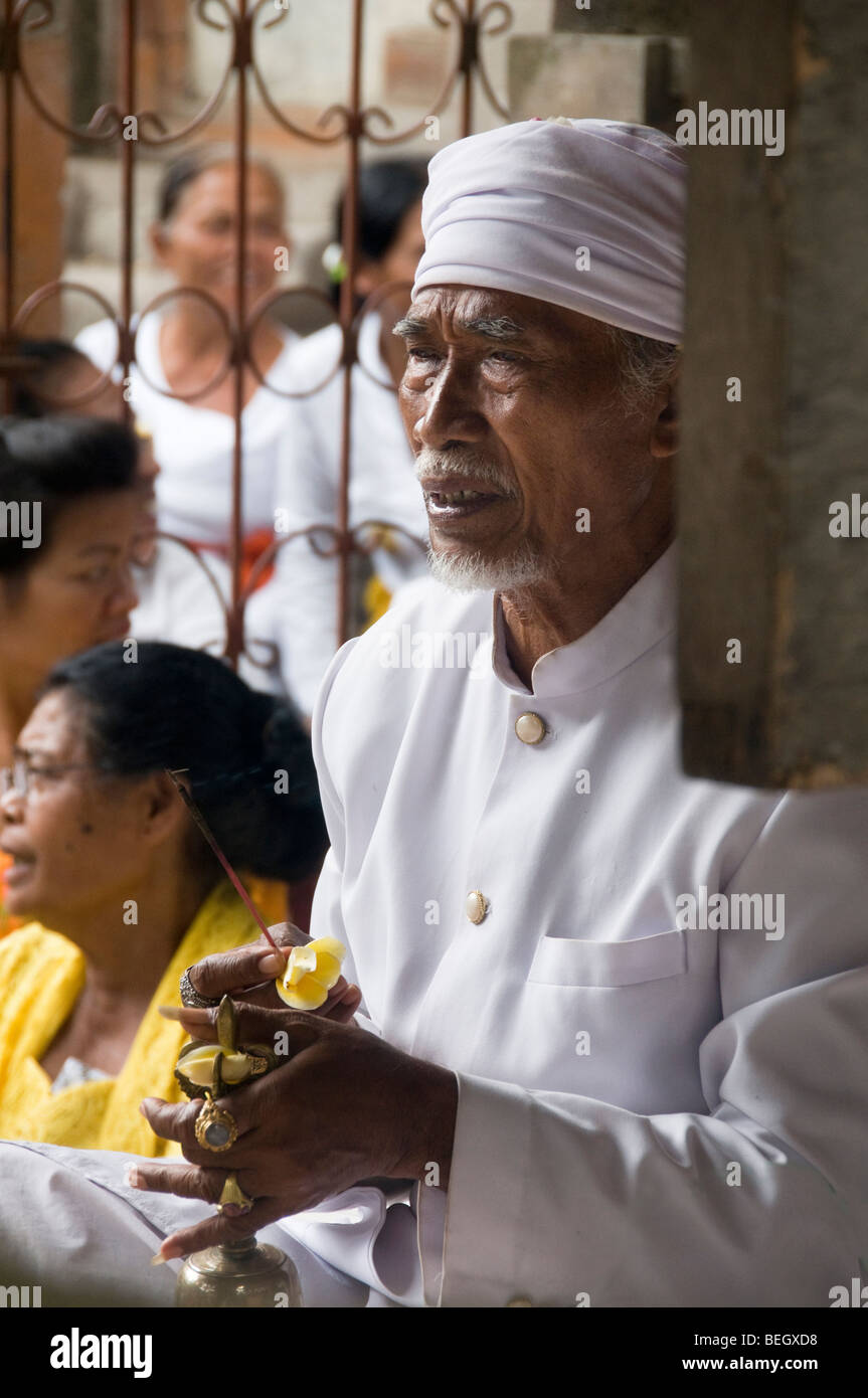 praying at temple during a local festival in Bali Indonesia Stock Photo ...