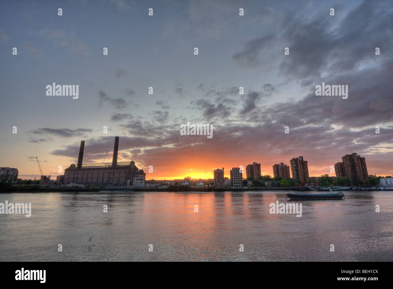 Sun setting behind Lots Road power station in Chelsea, London England ...