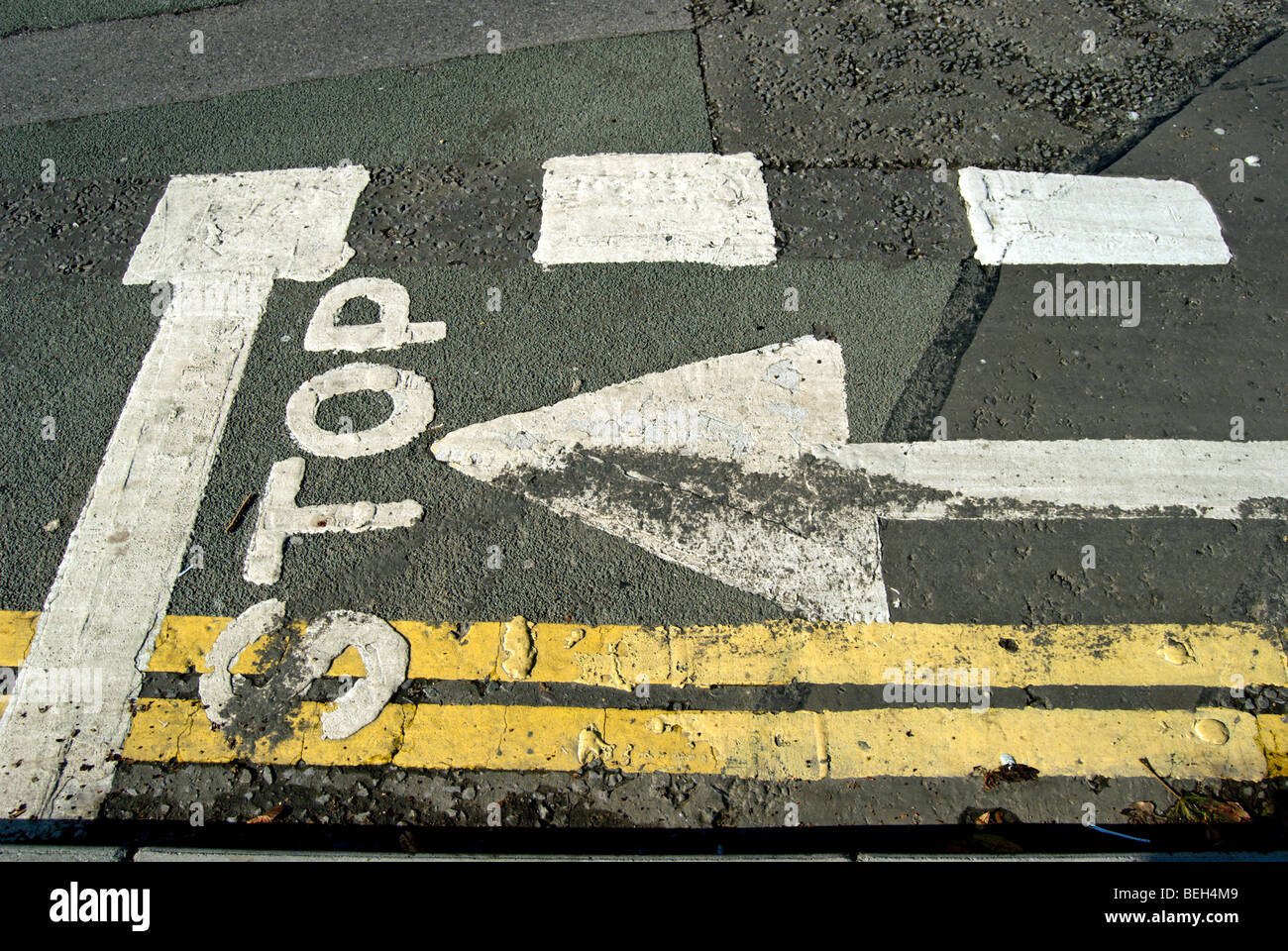 stop line and arrow in a cycle track at a road junction in kingston ...