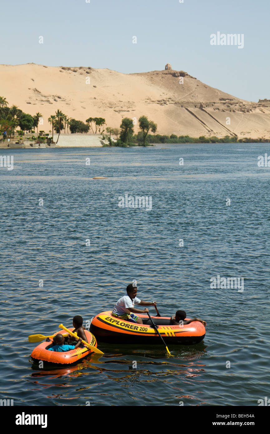 Children playing in Rubberboats on Nile River, Aswan, Egypt Stock Photo ...