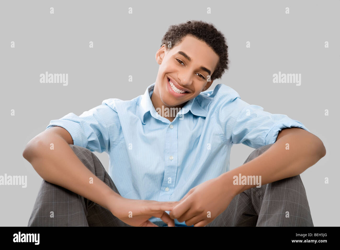 Portrait of a young man smiling Stock Photo - Alamy