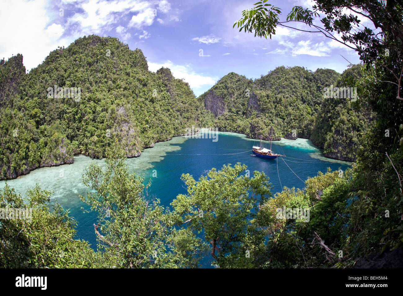 Boat anchor in Lagoon of Misool Island, Raja Ampat, West Papua ...