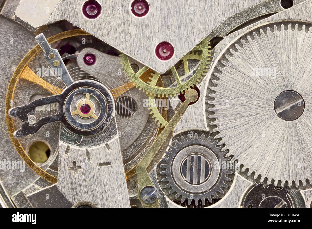 Ancient tiny metal clockwork close up background Stock Photo - Alamy