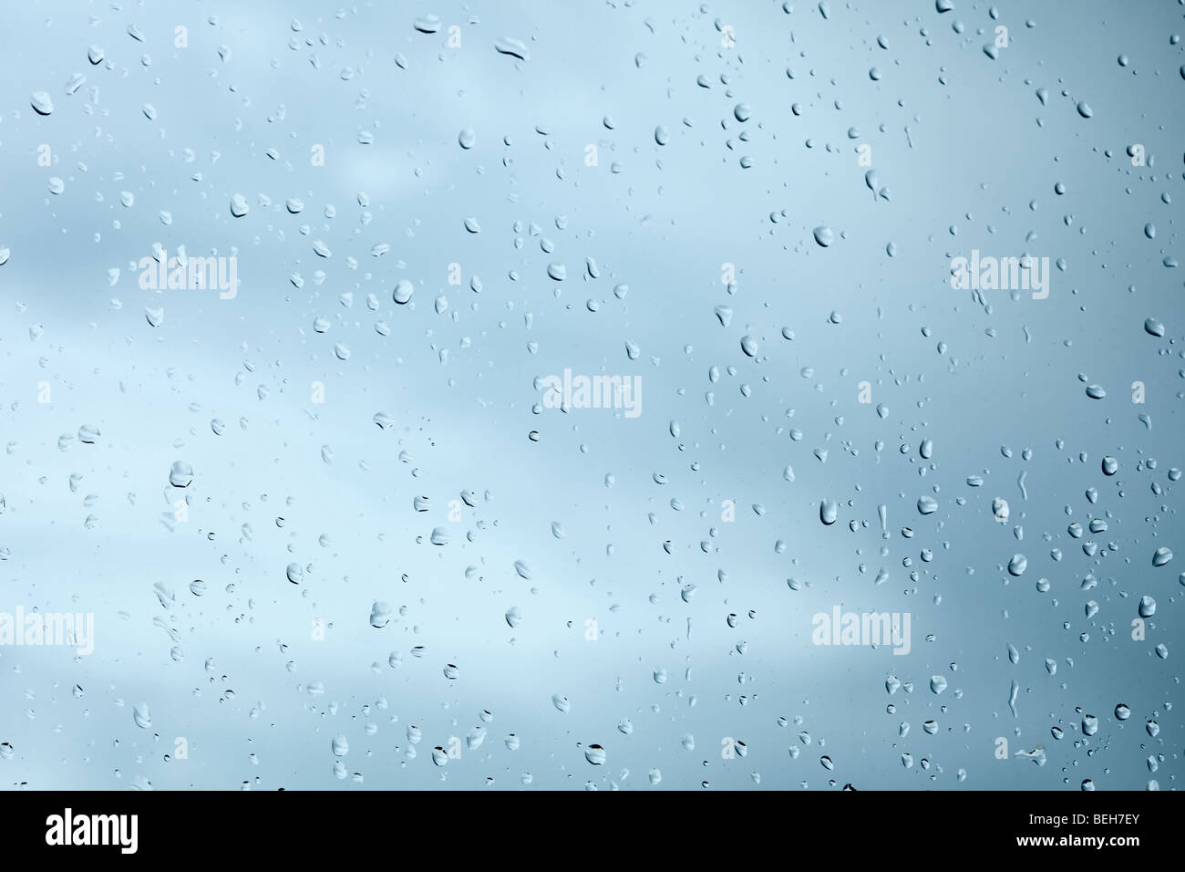 Droplets of rain water on a windowpane background Stock Photo - Alamy