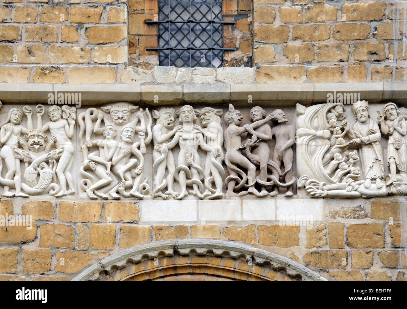 A beautifly carved modern replacement of a mediaeval frieze on the West ...