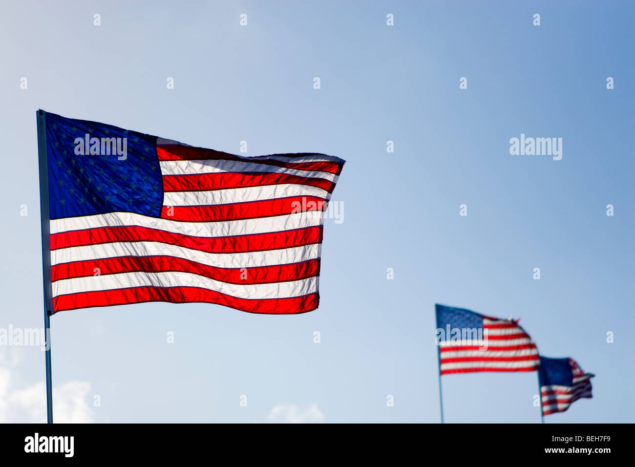 Waving three american flags hi-res stock photography and images - Alamy