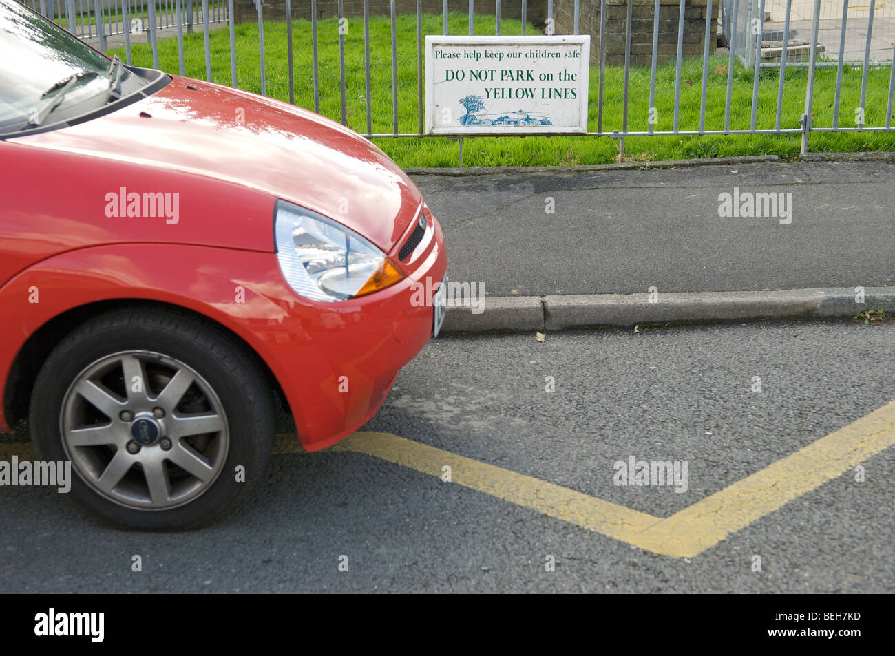 Car parked in restricted area outside school Stock Photo - Alamy