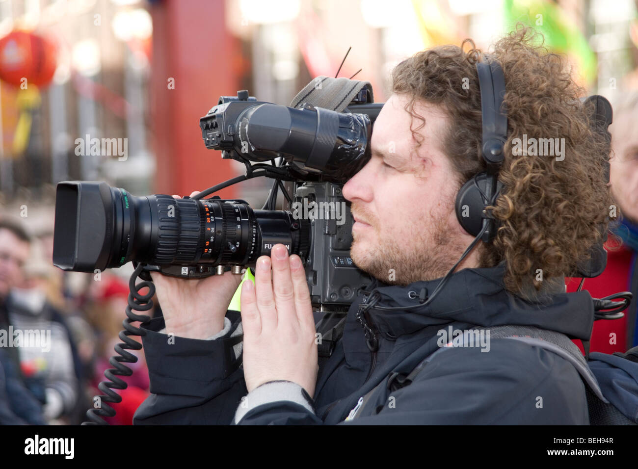 Film crew and cameraman at the Chinese New Year celebrations in the ...