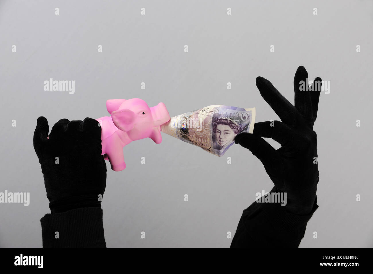 Financial squeeze on savings in piggy bank with low interest rates ...