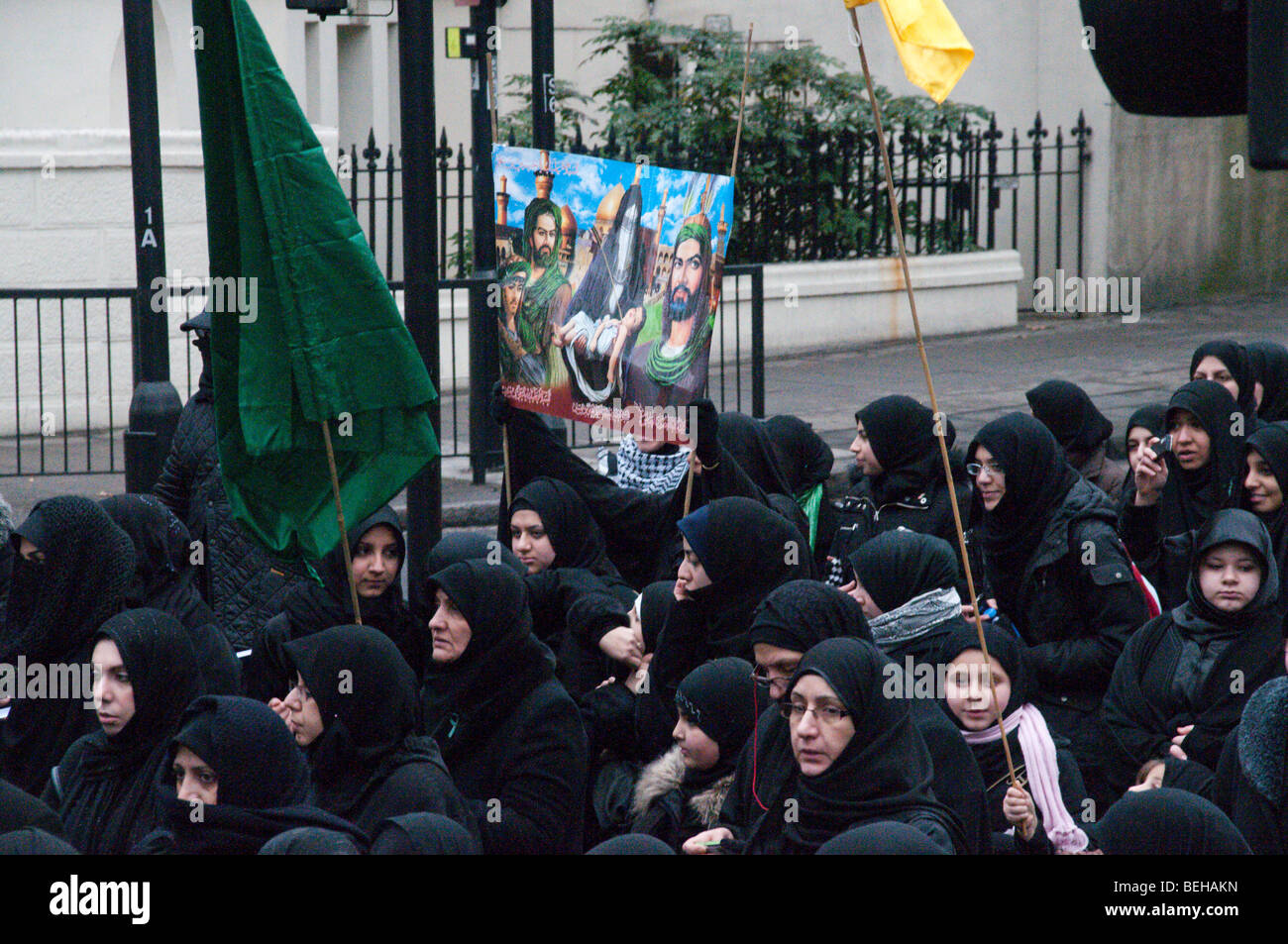 Shi'ite Muslims in annual Ashura Procession, London - women with banner ...