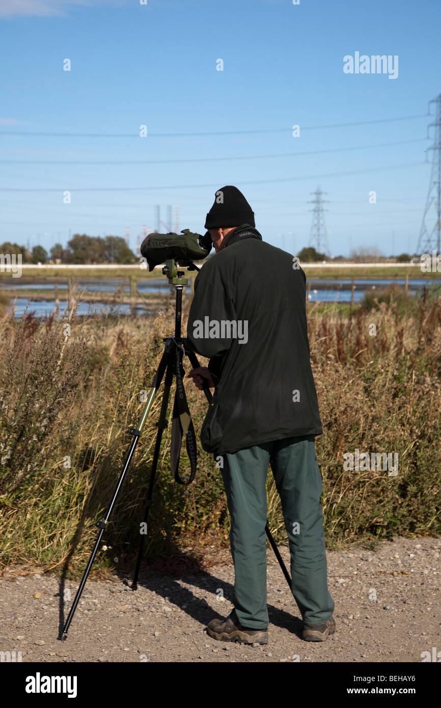 Birdwatching, or birding, birders, wildlife observation binoculars ...