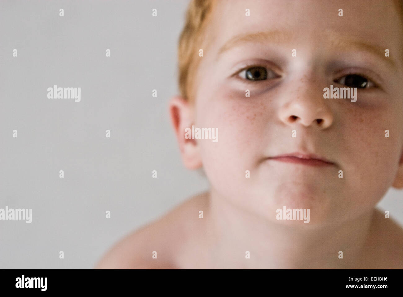 young red headed freckled boy making facial expressions Stock Photo - Alamy