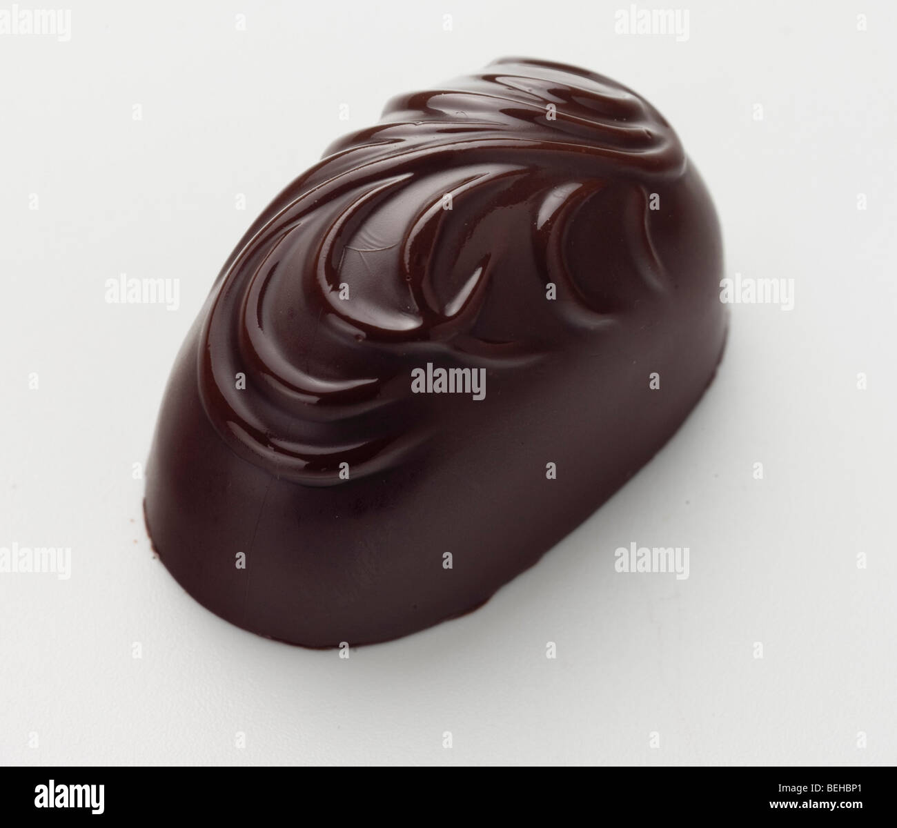 single gourmet dark chocolate praline Stock Photo - Alamy