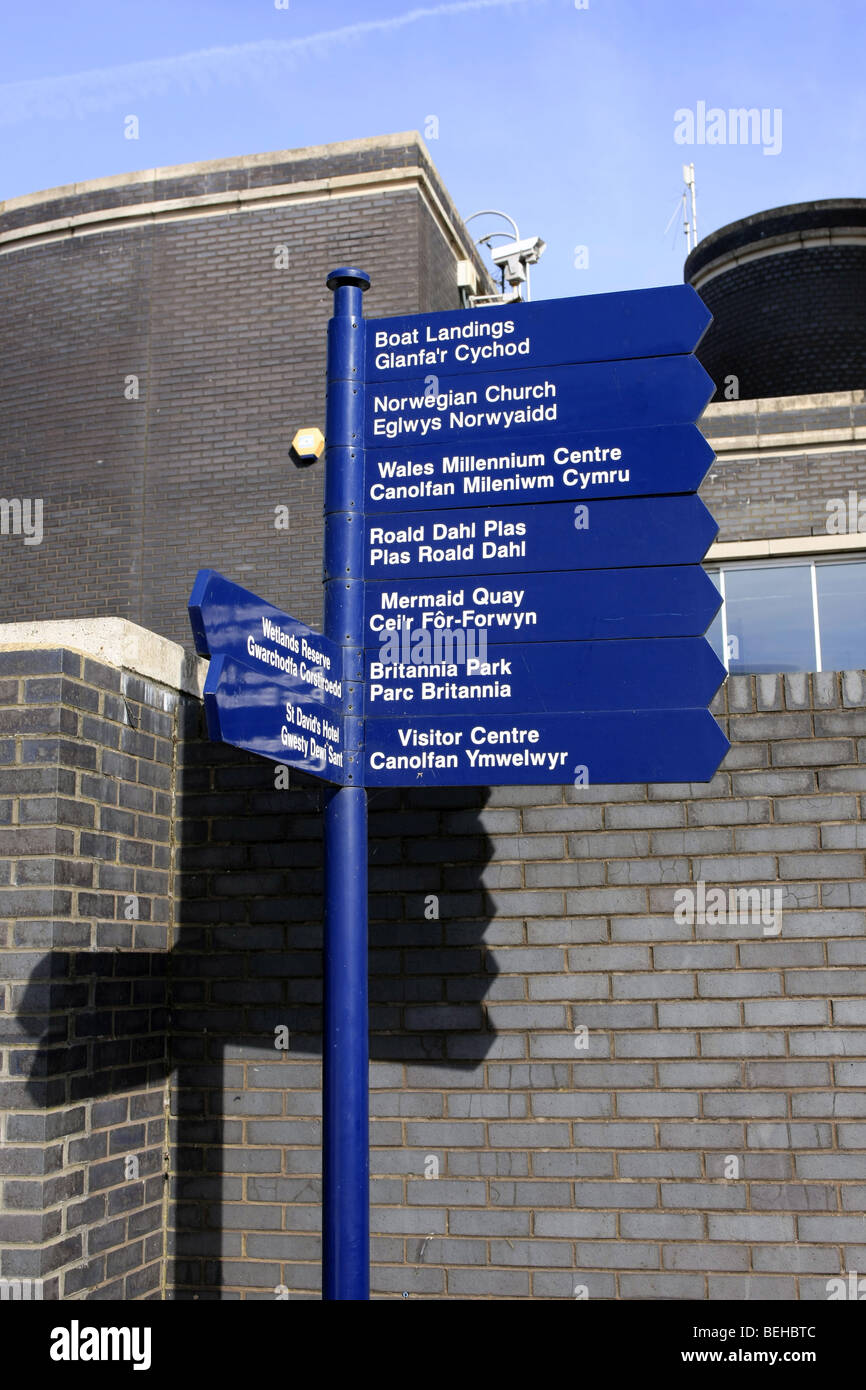 Signpost with directions written in English and welsh seen in Cardiff ...