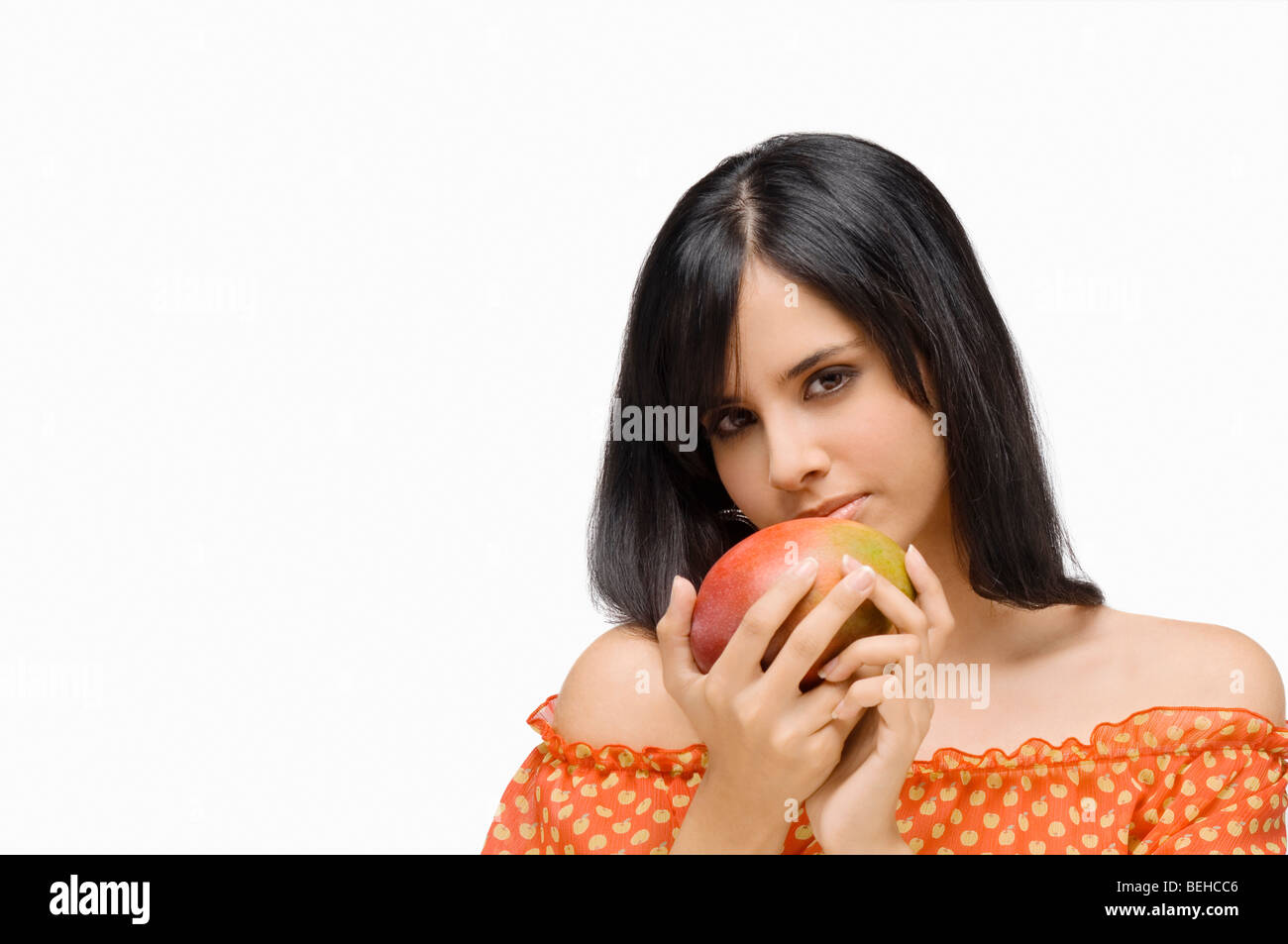Woman with a mango hi-res stock photography and images - Alamy