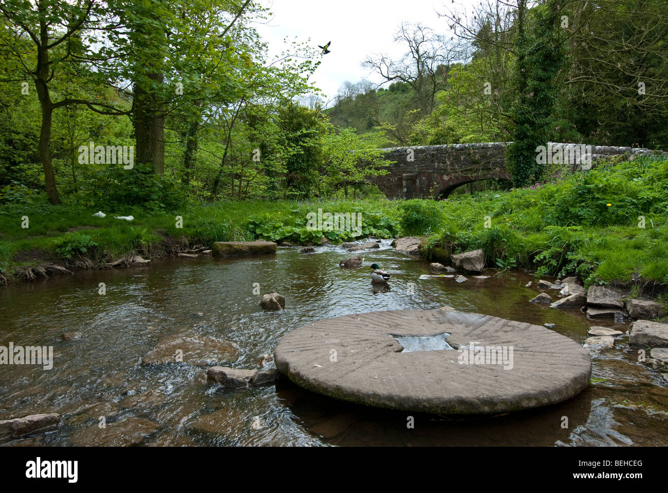 Viators Bridge and the River Dove at Milldale village in the Peak ...