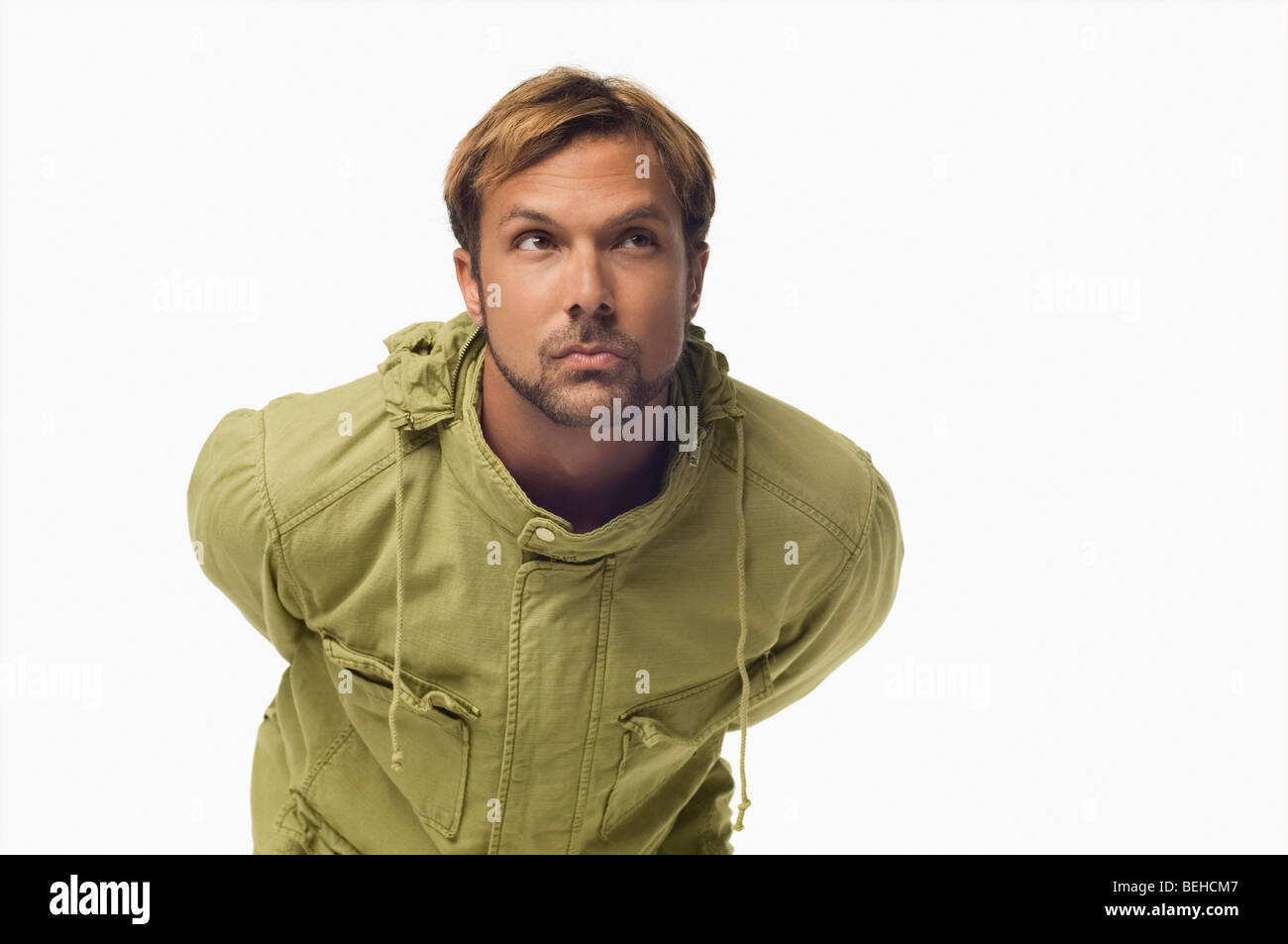 Close-up of a mid adult man bending forward Stock Photo - Alamy