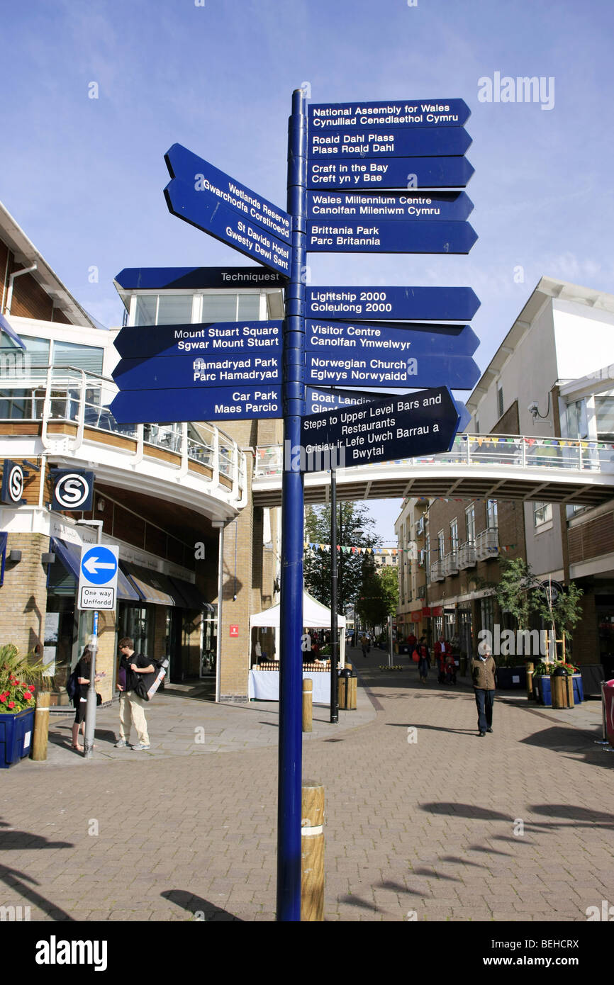 Signpost with directions written in English and welsh seen in Cardiff ...