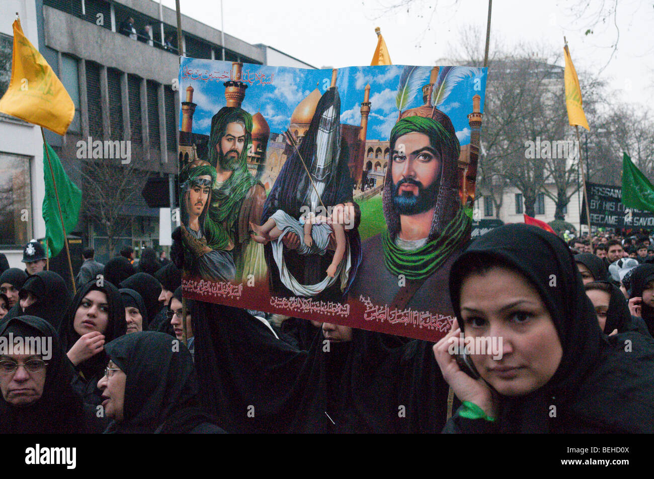 Shi'ite Muslims in annual Ashura Procession, London - women with banner ...