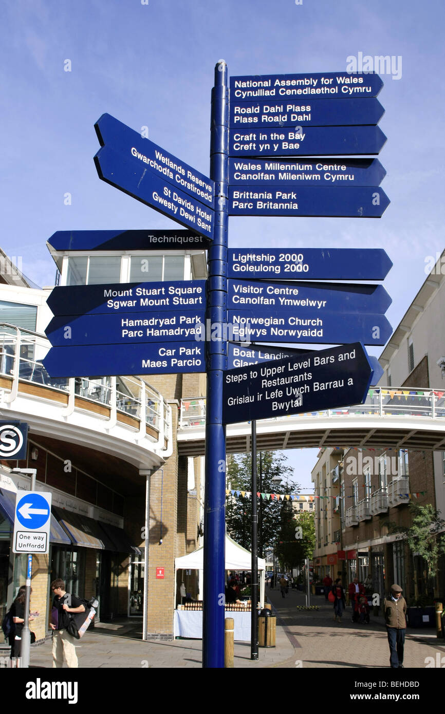 Signpost with directions written in English and welsh seen in Cardiff ...