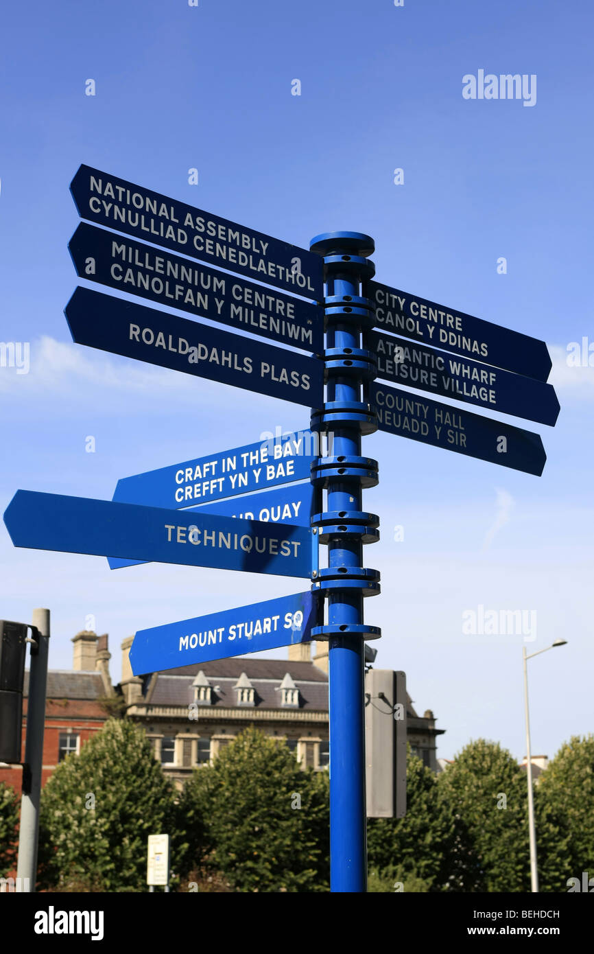 Signpost with directions written in English and welsh seen in Cardiff ...