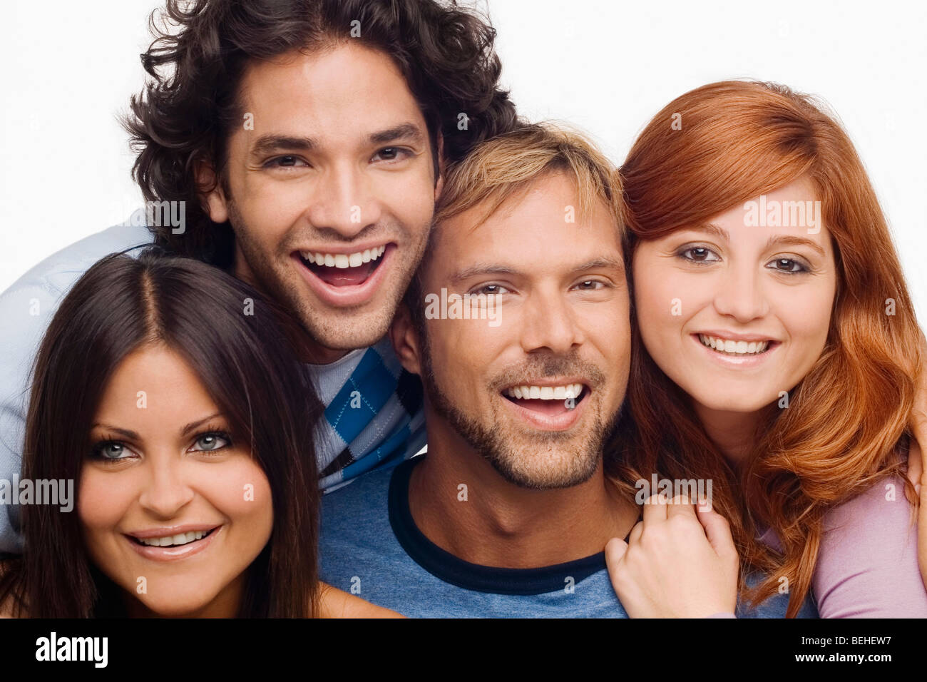 Portrait of a mid adult man smiling with his friends Stock Photo - Alamy