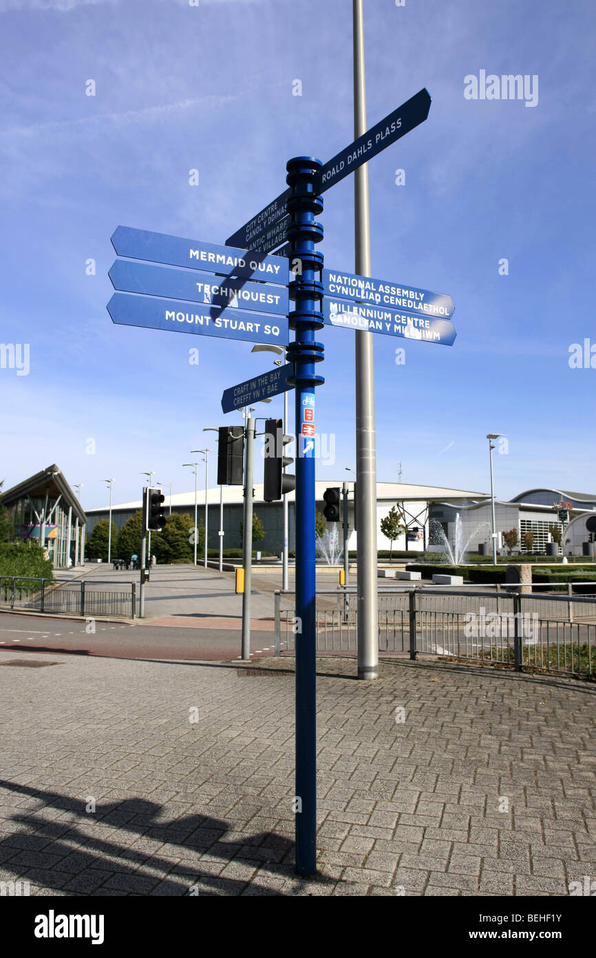 Signpost with directions written in English and welsh seen in Cardiff ...