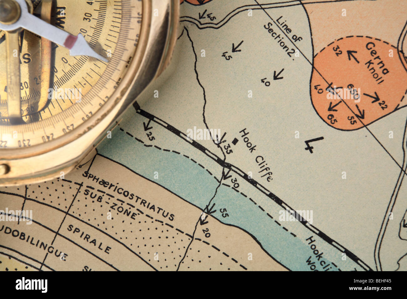 An old surveying compass on an out-of-copyright geological research map ...