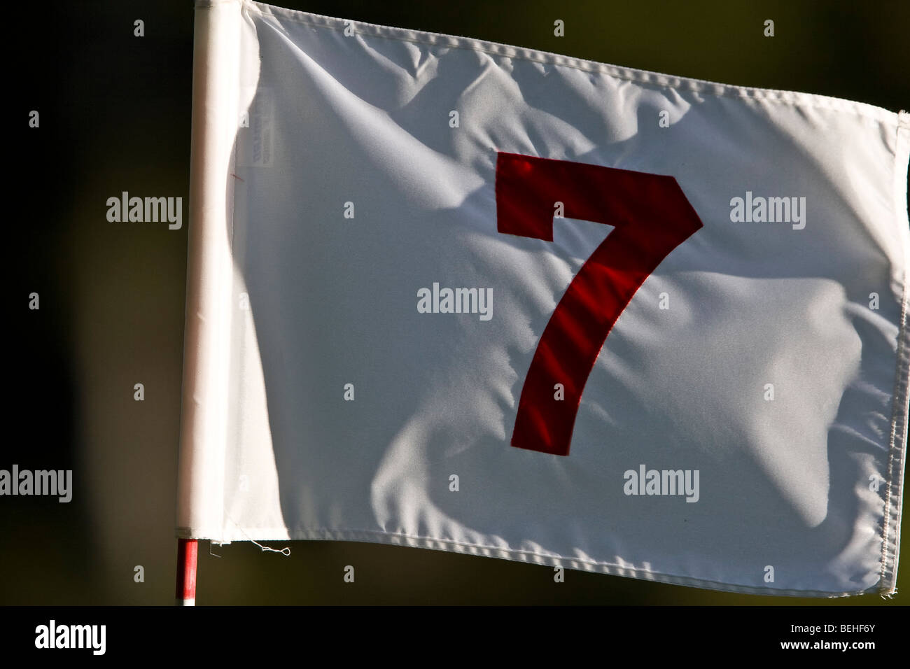 white flag with the red number 7 Stock Photo - Alamy