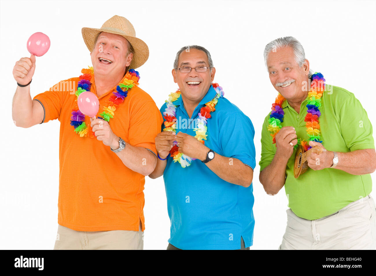 Portrait of a senior man and two mature men dancing Stock Photo - Alamy