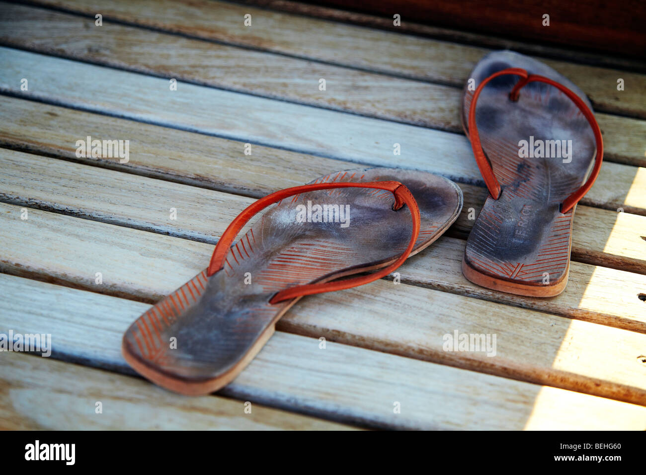Flipflops on wood hi-res stock photography and images - Alamy
