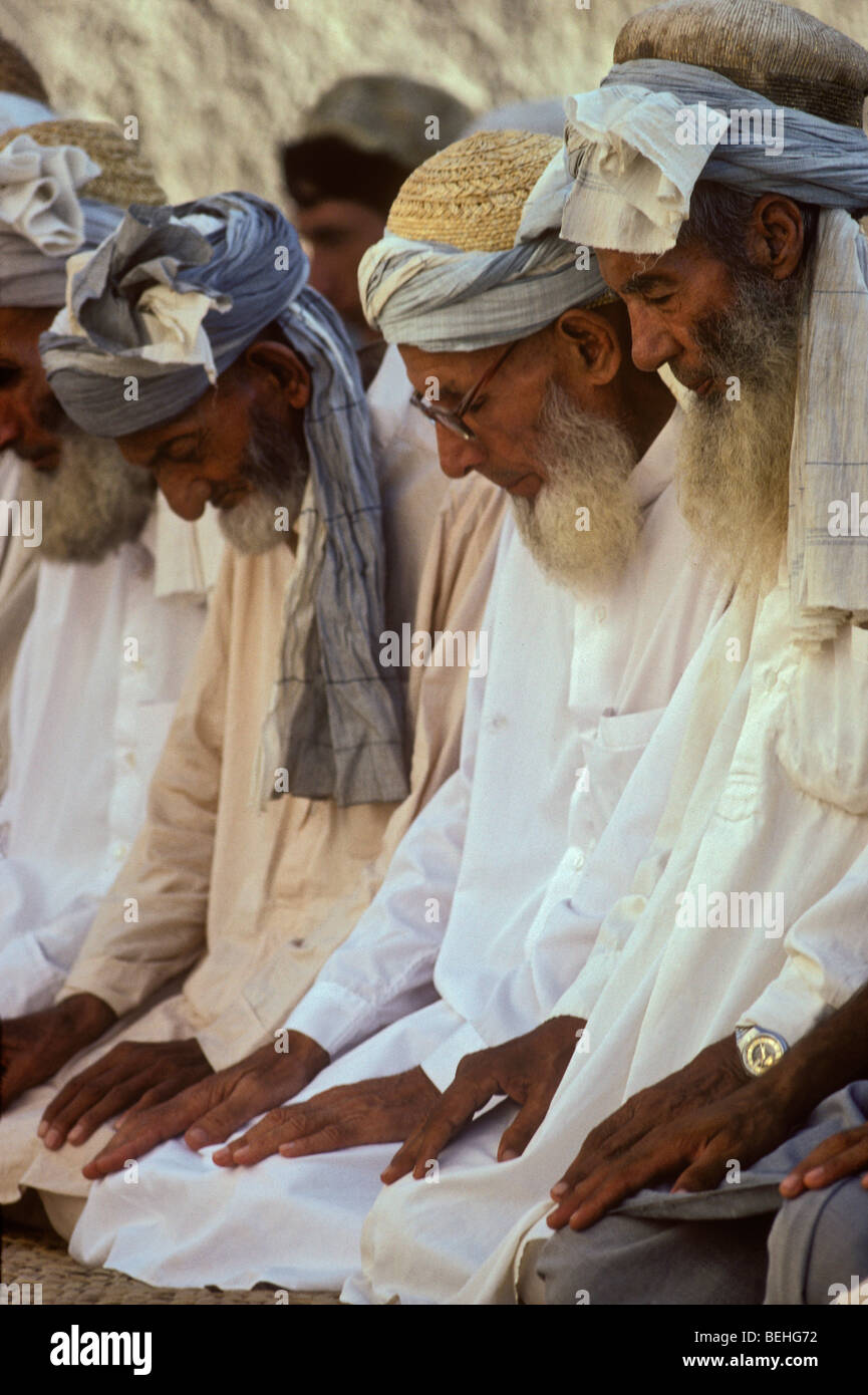 Pathan men praying at open-air mosque, Kado, Northwest Frontier ...