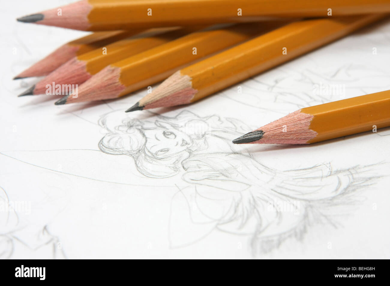 Cutout of sharp pencils and drawing on white background Stock Photo - Alamy
