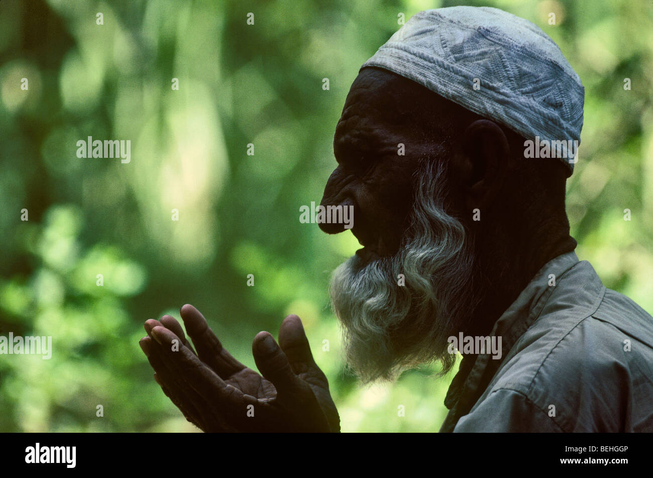Pathan man praying at open-air mosque, Kado, Northwest Frontier ...
